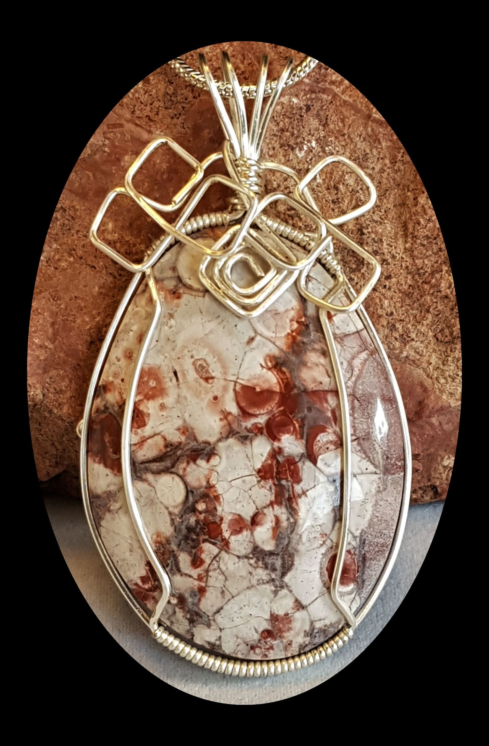 Noval, Wire wrapped, Light pink, Tan and Brown Volcanic Tuff Pendant