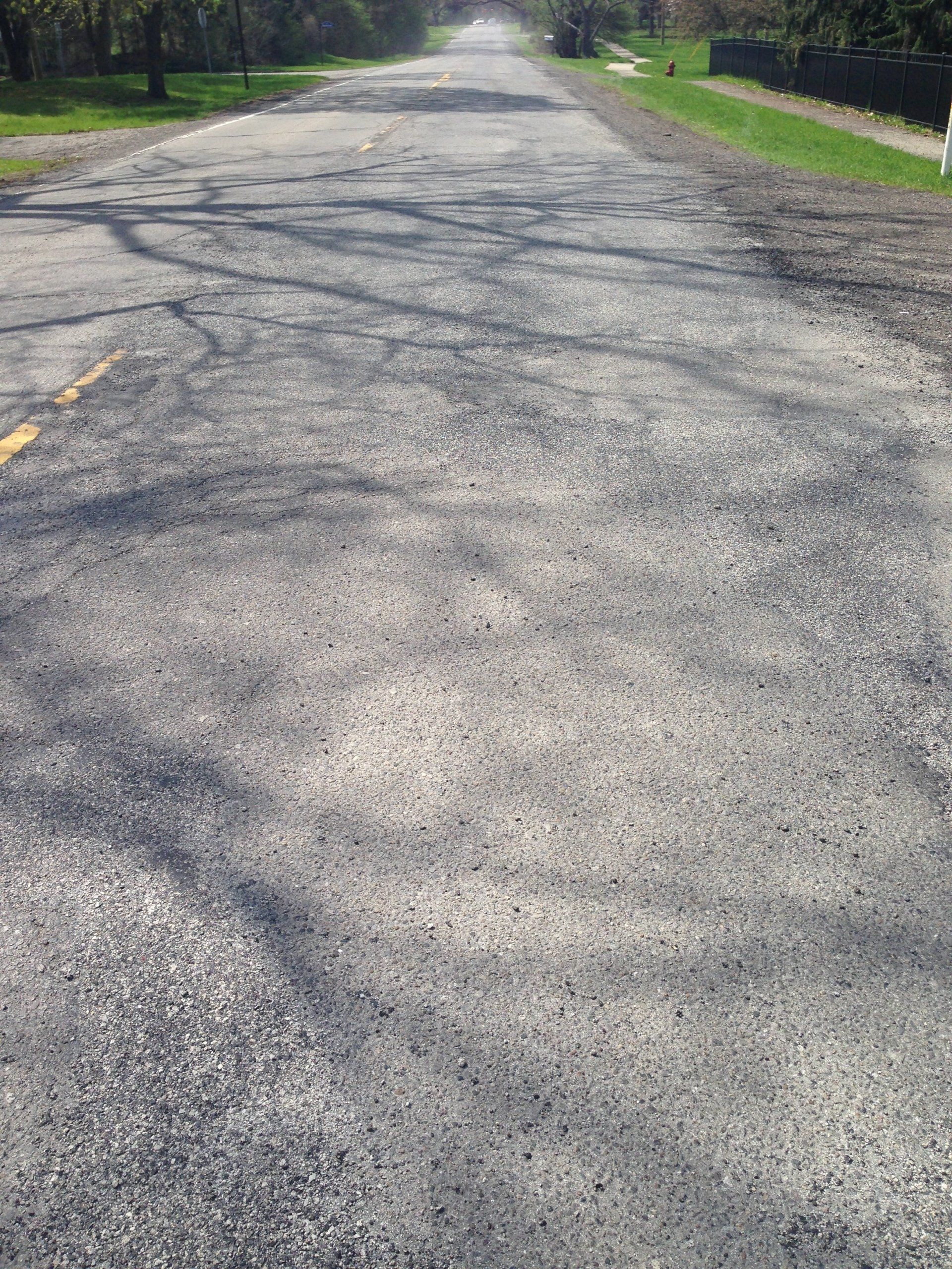 Spray Patch Road Repair - Fixing Michigan's Roads