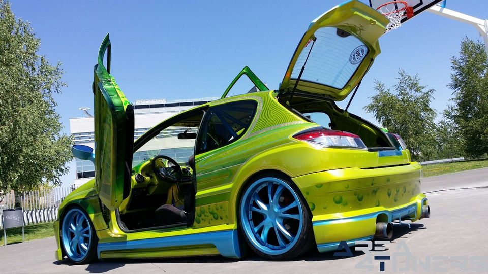 REPORTAJE COCHE TUNING AREA4TUNERS Peugeot 206 Innovate