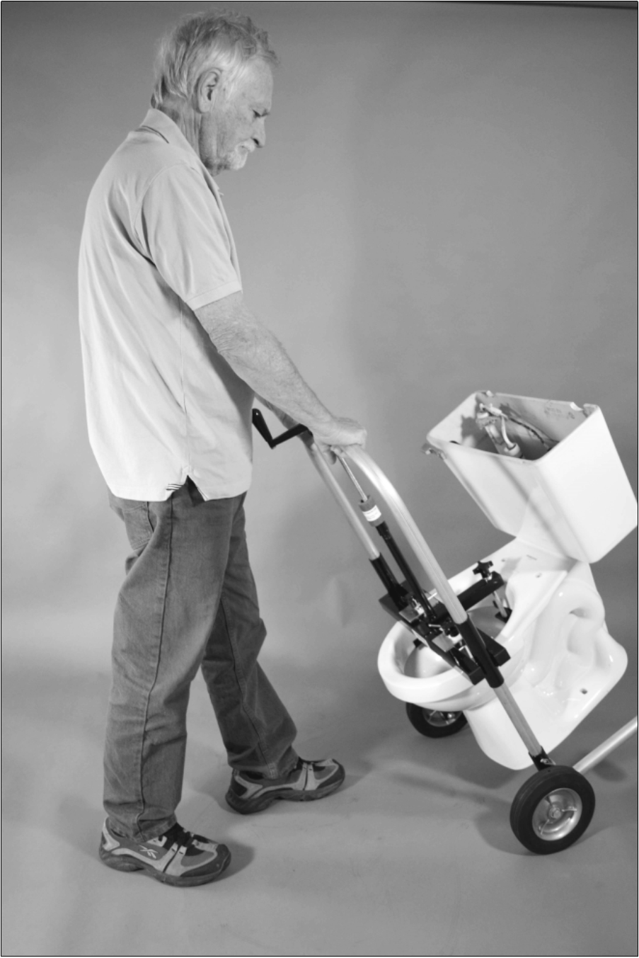 Toilet Kart, a plumbers tool to lift, set & move a toilet.