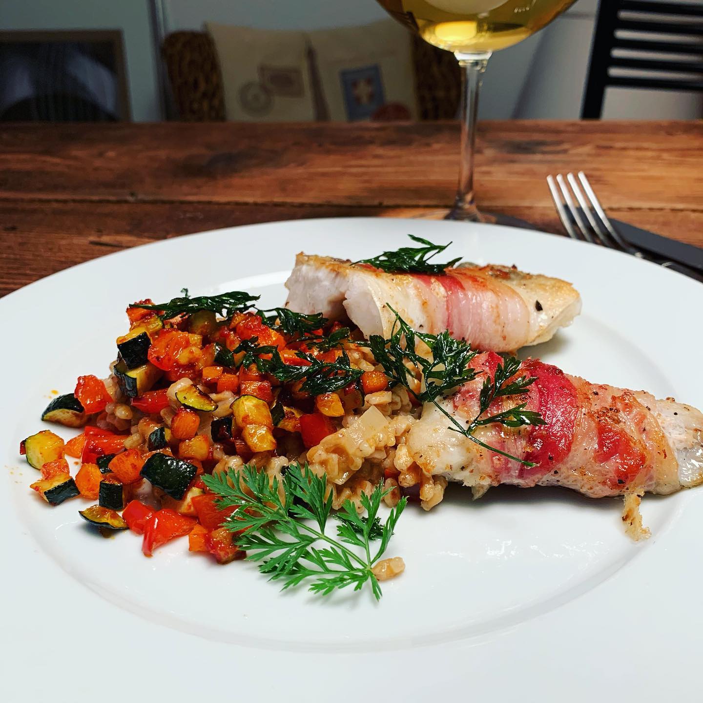 ZANDERFILET MIT SPECK UND DINKEL-RISOTTO